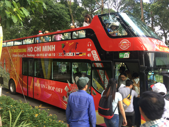 xe-bus-mui-tran-2 - Quảng cáo trên xe bus, tay cầm, nhà chờ xe buýt ...